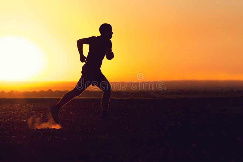 Man Silhouette Running in the Field Stock Image - Image of commitment ...