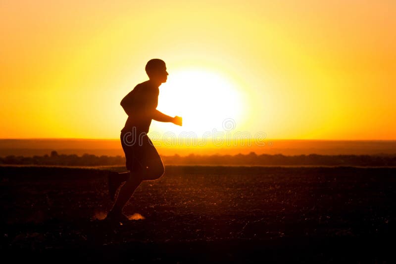 Man Silhouette Running in the Field Stock Image - Image of commitment ...
