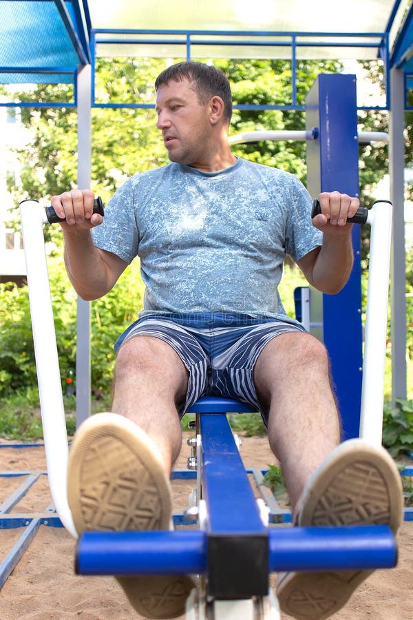 Man on the Simulator, Physical Culture Stock Photo - Image of lifestyle ...