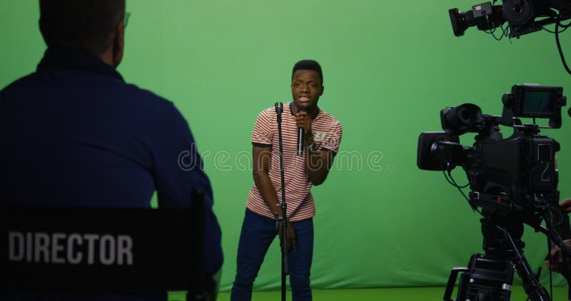 Man singing at an audition stock image. Image of black - 135510083