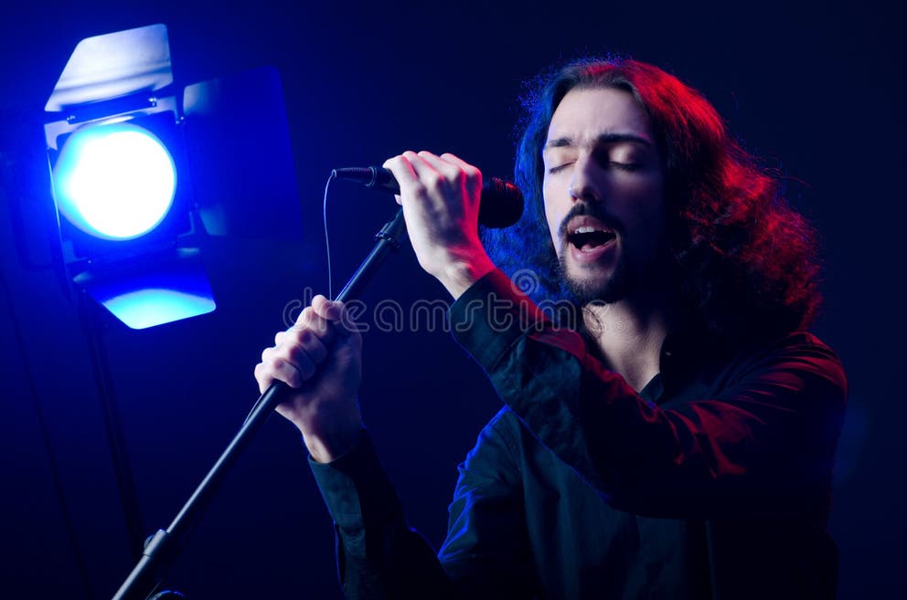 Man singing at the concert stock photo. Image of microphone - 23111586
