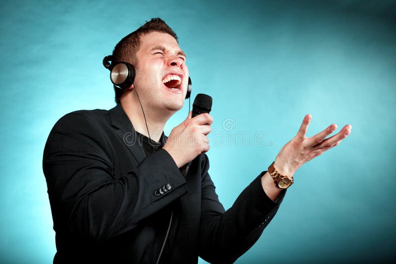 Man Singing Into Microphone Happy Karaoke Signer Stock Photo - Image of ...