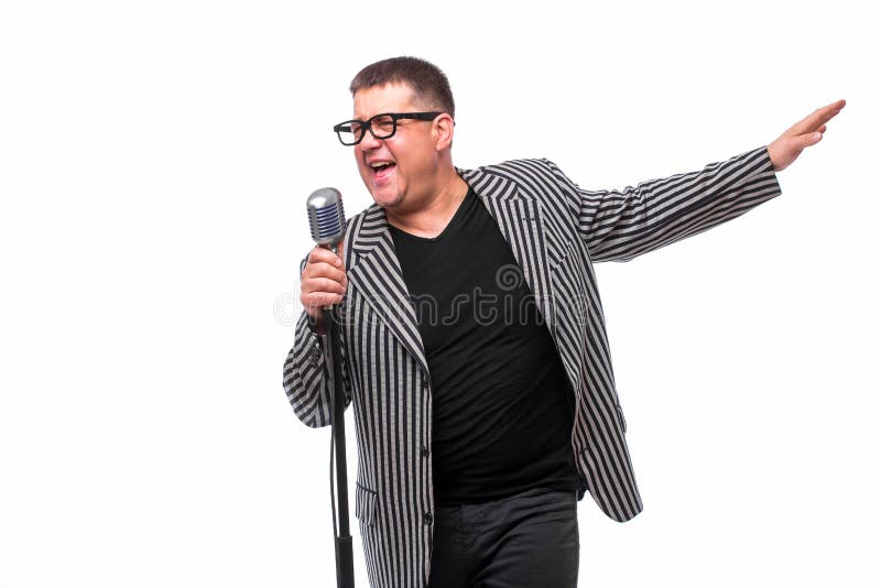 Man singing in microphone stock photo. Image of elegant - 72211990