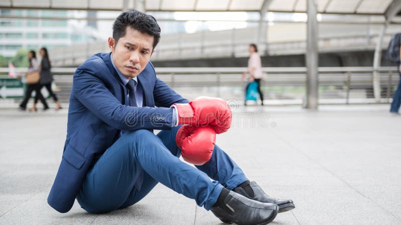 A Man Sit Alone and Tiring after Fighting for His Work Stock Photo ...