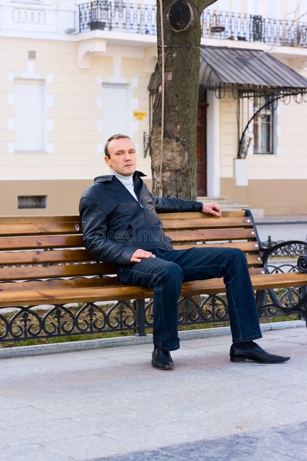 Man sit on bench stock photo. Image of cold, look, kind - 9073118