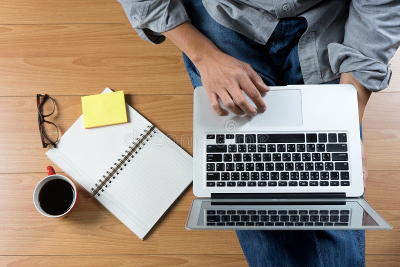 Man sit on floor computer stock image. Image of casual - 75529739