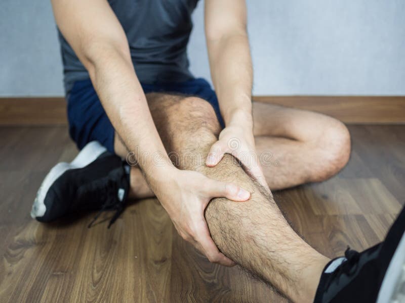 Man Sit and Rest on Gym Floor with Water Sport Bottle Stock Photo ...