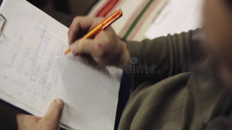 Man Underline Words in List on Sheet of Paper in Folder by Pen. Write ...