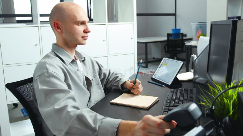 Man Taking Notes in Modern Office during the Day Stock Footage - Video ...