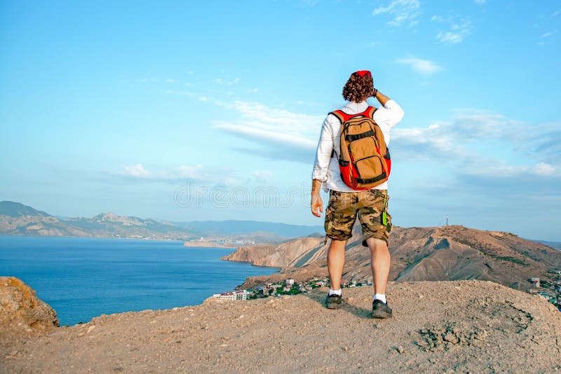 A Man Overlooking a Panoramic View of a Beautiful Coastline Stock Image ...