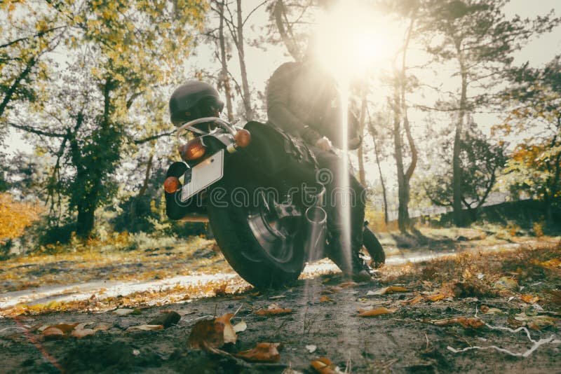 A Man Sits on a Retro Motorcycle in the Sun Stock Image - Image of sits ...