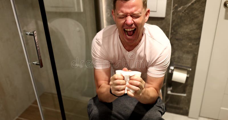 Man Sits On Toilet With Toilet Paper And Suffers From Constipation Stock Video Video Of