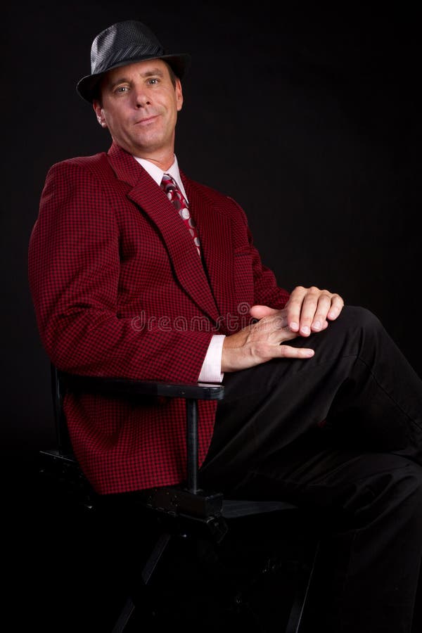 Man Sitting stock photo. Image of coat, businessman, black - 16340540