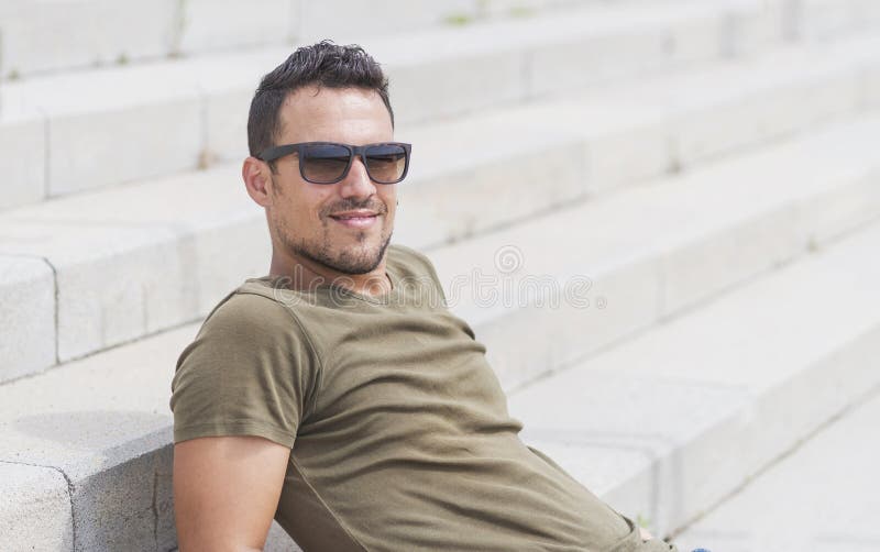 Man Sitting Alone on Steps. Handsome Boy with Sunglasses Stock Image ...