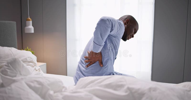 Man Sitting on Bed Suffering Stock Photo - Image of sick, pain: 281332830