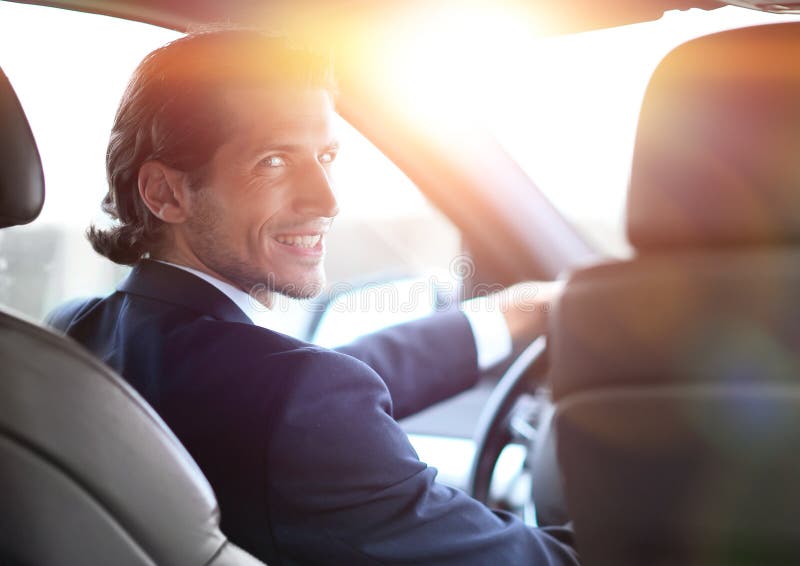 Man Sitting Behind the Wheel of a Car Stock Photo - Image of casual ...