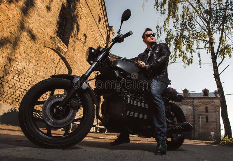 Motorcyclist with a Cafe-racer Motorcycle Stock Photo - Image of ...