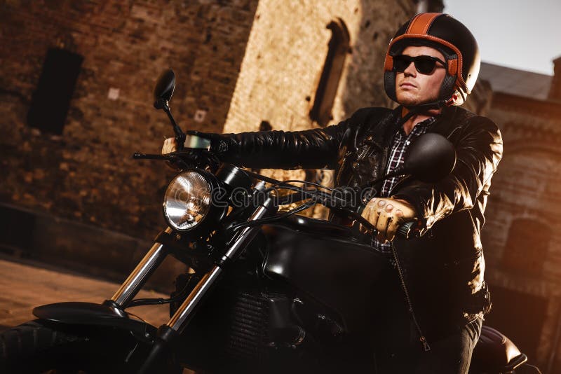 Motorcyclist with a Cafe-racer Motorcycle Stock Photo - Image of ...