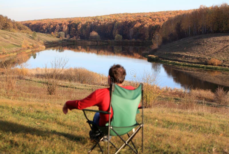 Man Sitting on Chair for Rest Stock Photo - Image of river, angler ...