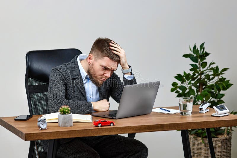 Man Sitting on Chair at Table and Resting, Using Laptop Stock Photo ...