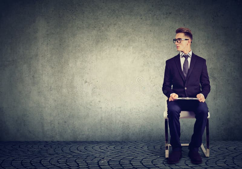Man Sitting on a Chair Waiting for Job Interview Stock Image - Image of ...
