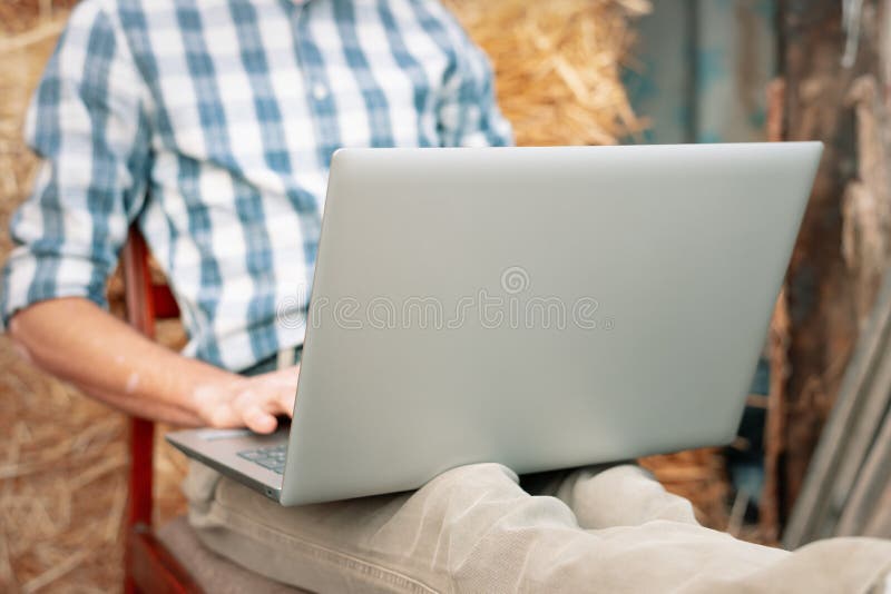 Man Sitting on Chair Working with Laptop Outdoors Stock Image - Image ...