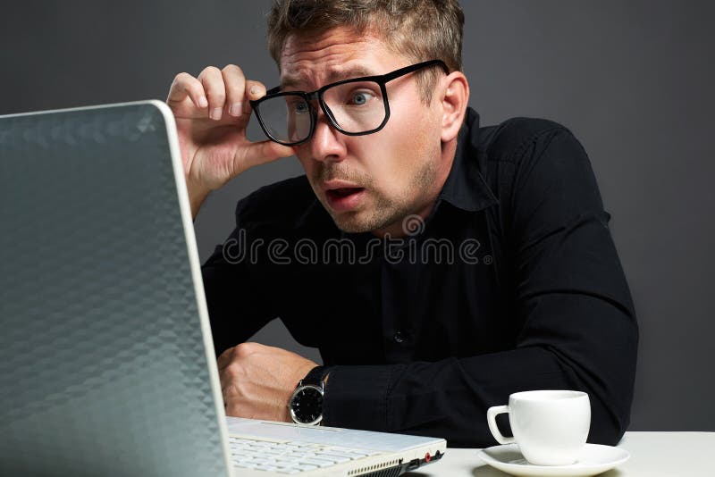 Man Sitting at a Computer. Funny Boy in Glasses Stock Photo - Image of ...