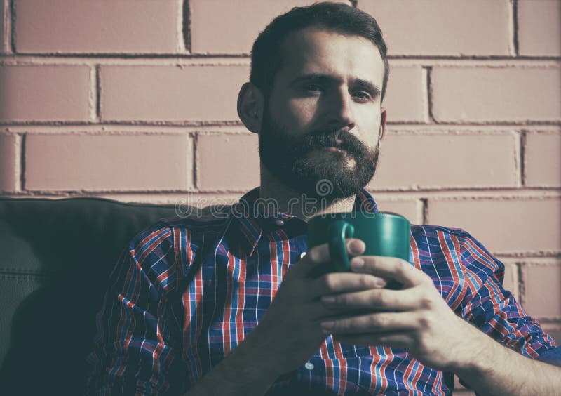 Man Sitting with Cup of Morning Coffee or Tea Stock Photo - Image of ...