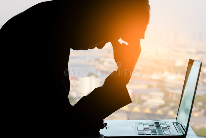 A Man Sitting Down, His Face Unsettled. at the Computer Desk he Has ...