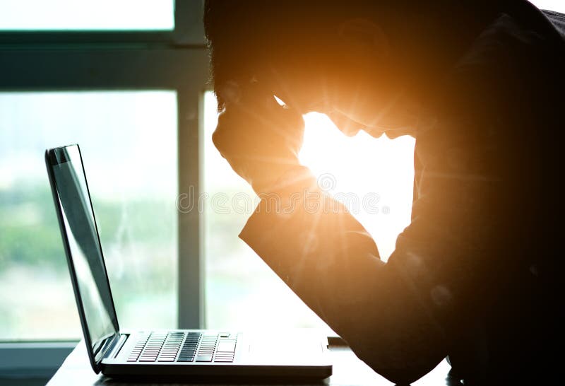A Man Sitting Down, His Face Unsettled. at the Computer Desk he Has ...