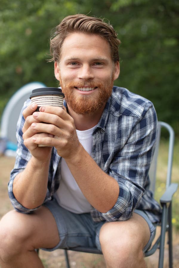 Man Sitting Drinking Tea or Coffee on Campsite Stock Image - Image of ...