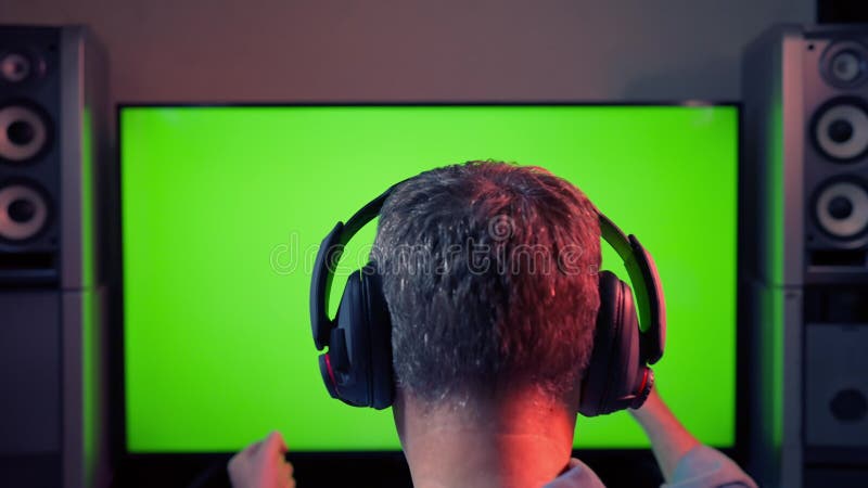 Man Sitting Facing Away Towards a Blank Computer Screen Stock Footage ...