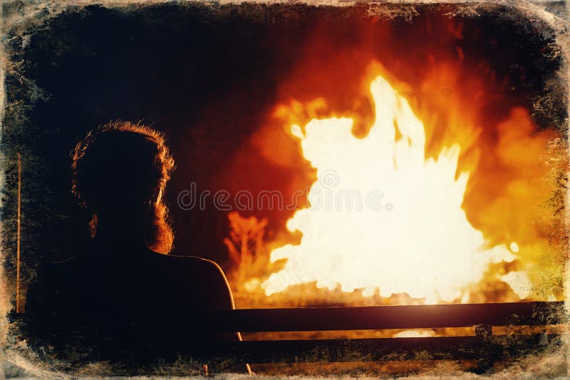 Man Sitting by the Fire and Looking To the Flame, Old Photo Effect ...