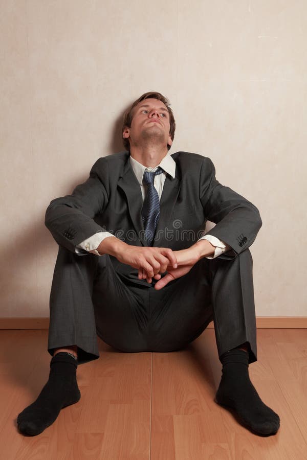 Man sitting on the floor stock image. Image of model - 21766645
