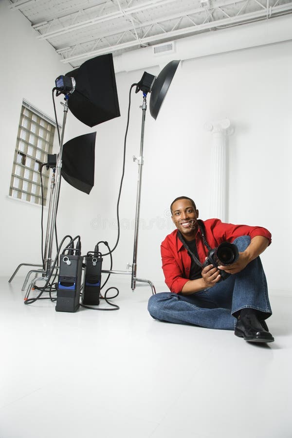 Photographer with a model. stock photo. Image of profession - 2044448