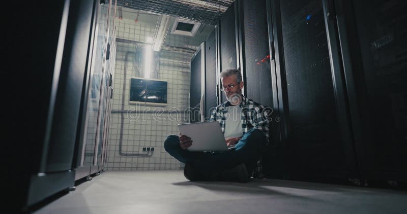 Man Sitting on Floor in Server Room Stock Footage - Video of cables ...