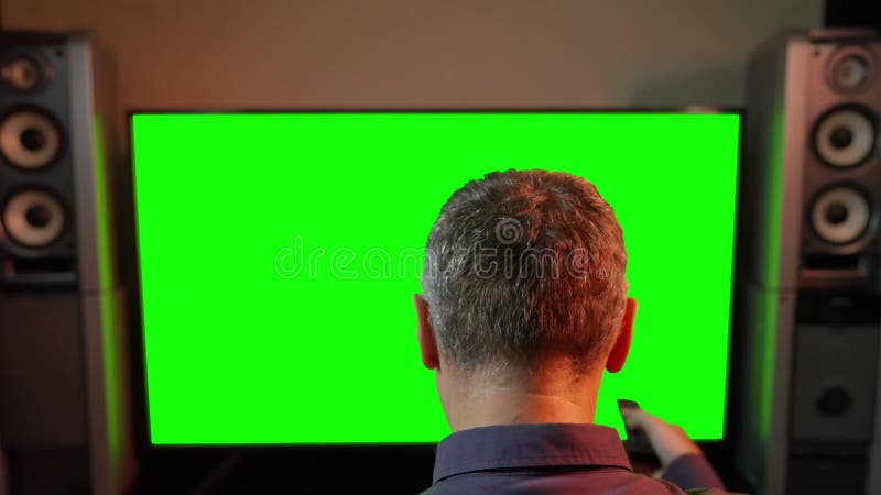 Rear View of the Head of a Man Facing a Blank Screen Stock Video ...