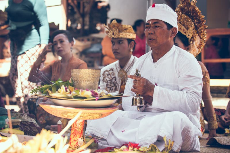 Man Sitting In Front Of Woman Near Table Performing Ritual Ceremony ...