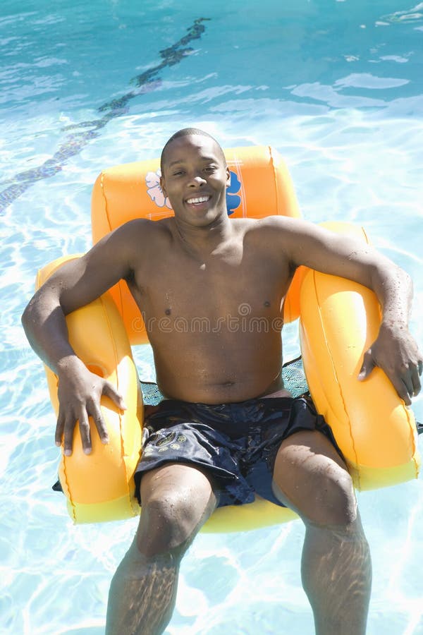 Man Sitting on Inflatable Raft Stock Photo - Image of float, lifestyle ...