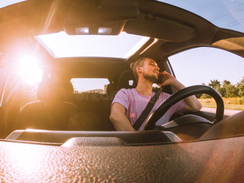 Man Sitting Inside the Car Driving Stock Photo - Image of cars, trip ...