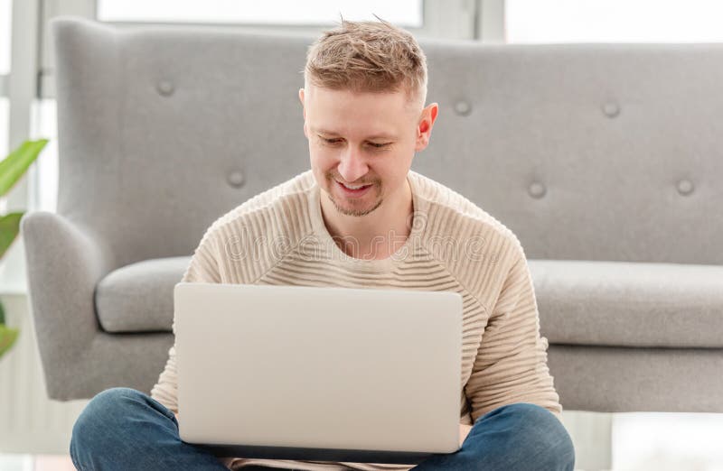 Man sitting with laptop stock image. Image of reading - 211720295