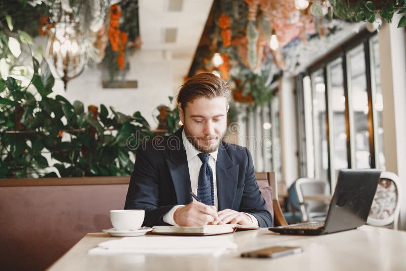 Man Sitting with Laptop in a Cafe Stock Image - Image of isolated ...
