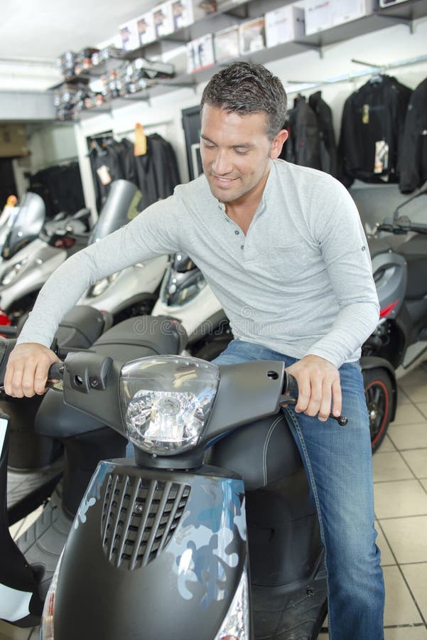 Modern Scooter with Vintage Design on the Old City Street Stock Photo ...