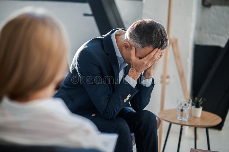 Man Sitting at the Psychologist and Speaking about His Problems Stock ...