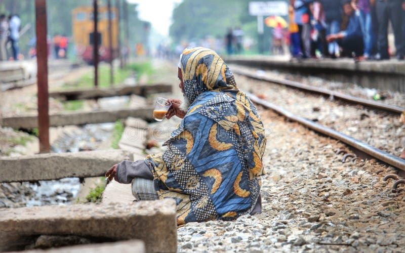 A man sitting in rail line editorial photography. Image of rail - 91505502