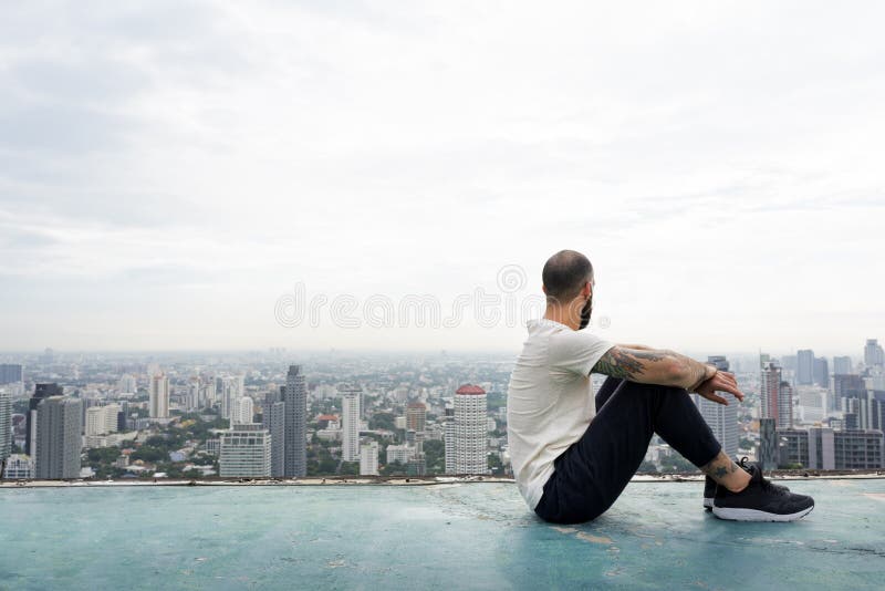 Man Sitting Rest Rooftop Concept Stock Photo - Image of city, clouds ...