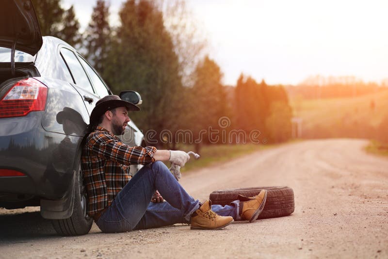 Man is Sitting on the Road by the Car Stock Image - Image of journey ...
