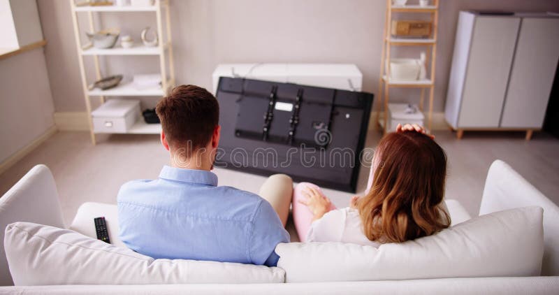 Man Sitting on Sofa in Front Fallen Television Stock Image - Image of ...