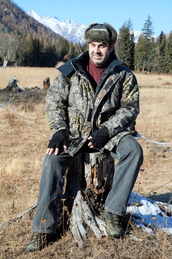 721 Man Sitting Stump Stock Photos - Free & Royalty-Free Stock Photos ...