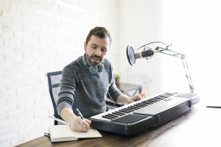 Songwriter at his studio stock photo. Image of writing - 117750076